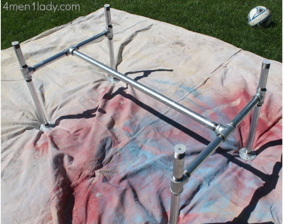 How to Build a DIY Pipe and Wood Table - KnockOffDecor